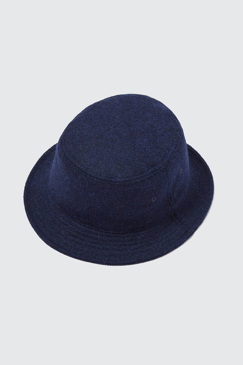 Buy online Universal Works Lewis Hat - Indigo LW Harris Tweed ...